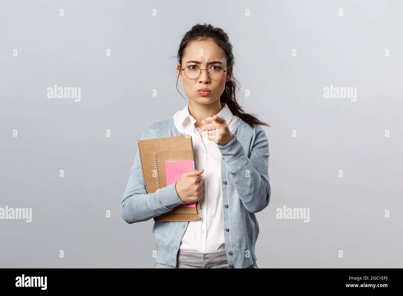 Education, teachers, university and schools concept. Portrait of angry ...