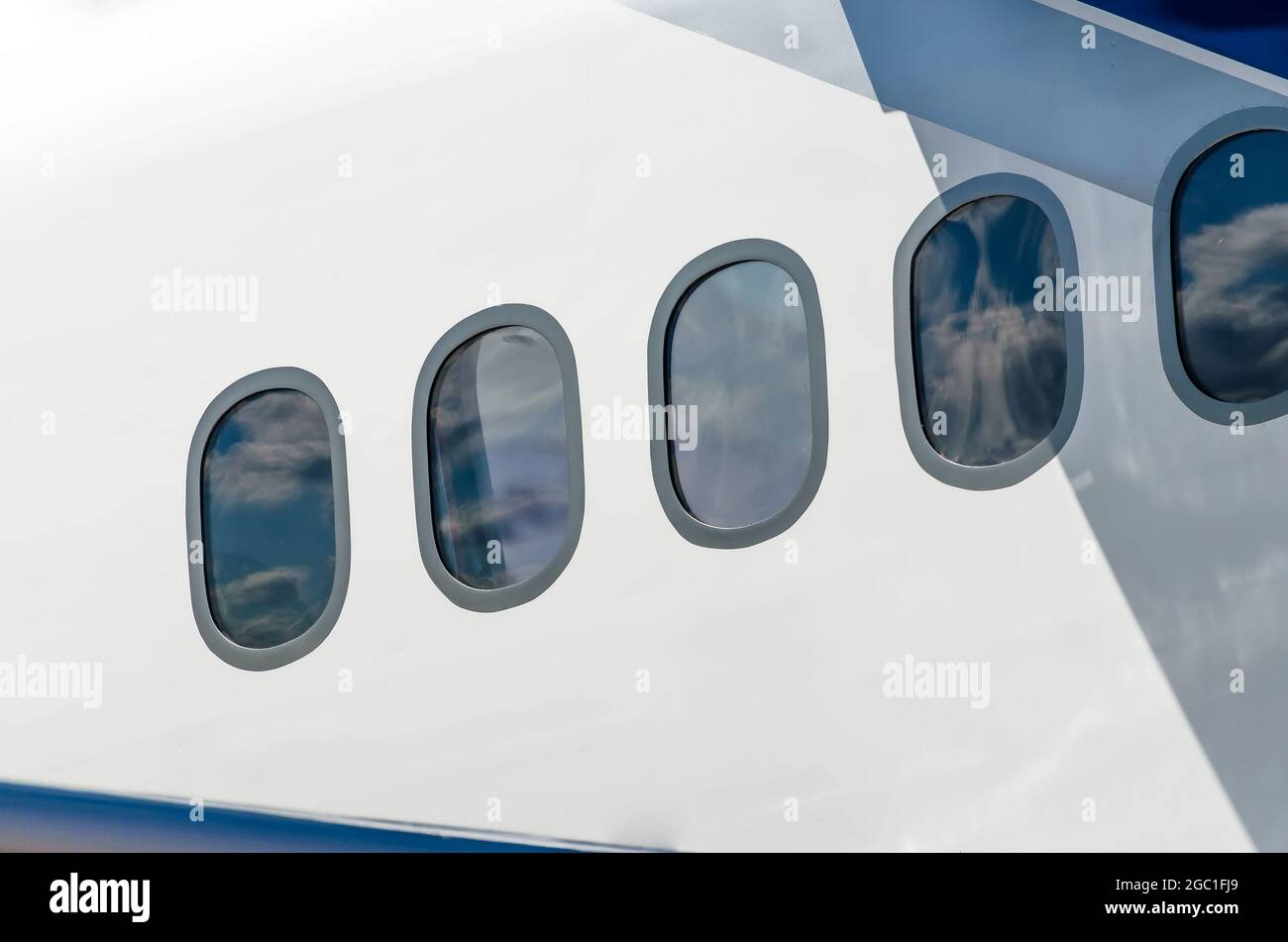 Sky with white clouds viewed from inside an airplane windows Stock ...
