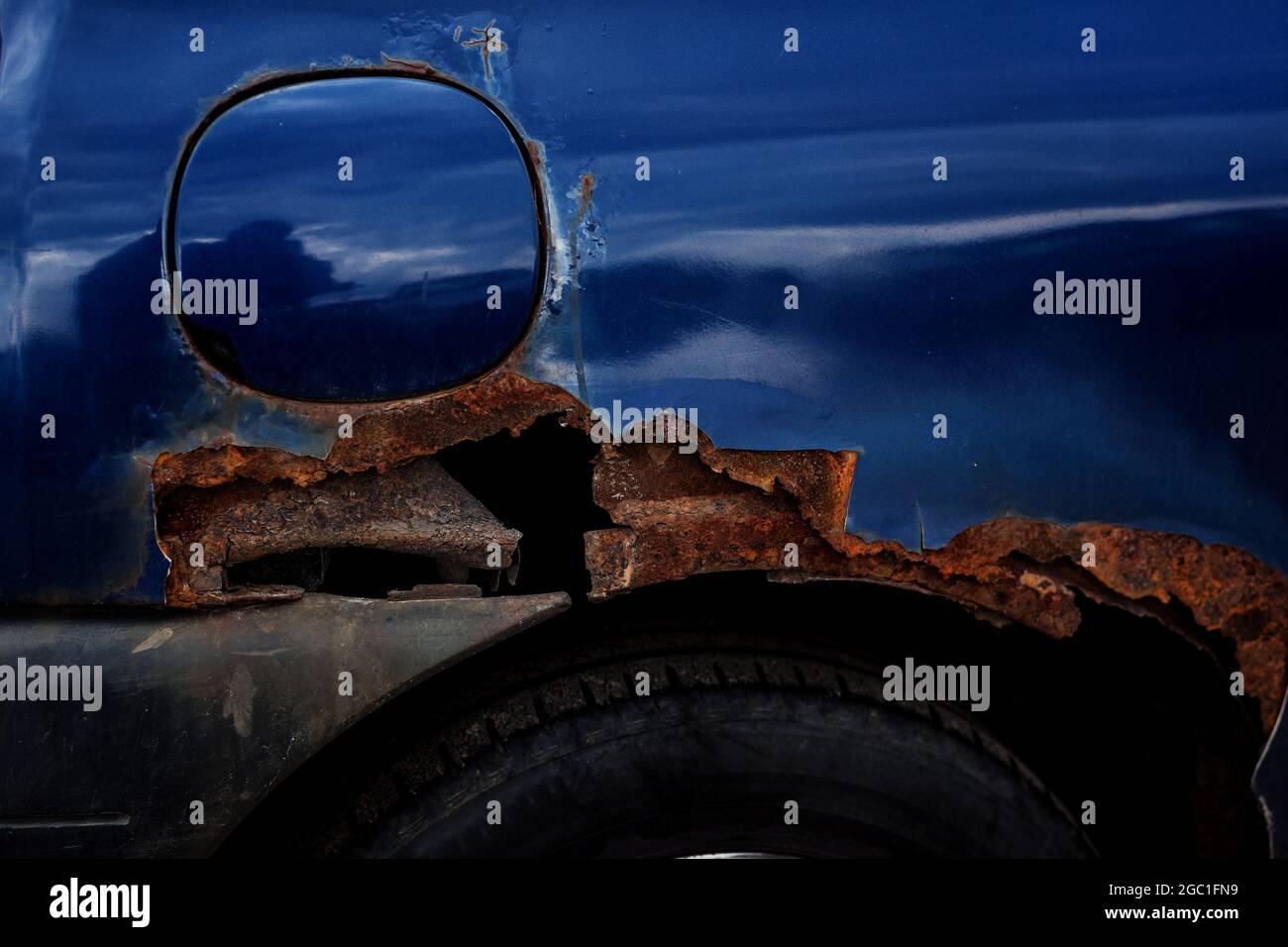 Corrosion of metal on a car body, close up. Rust on the car Stock Photo ...