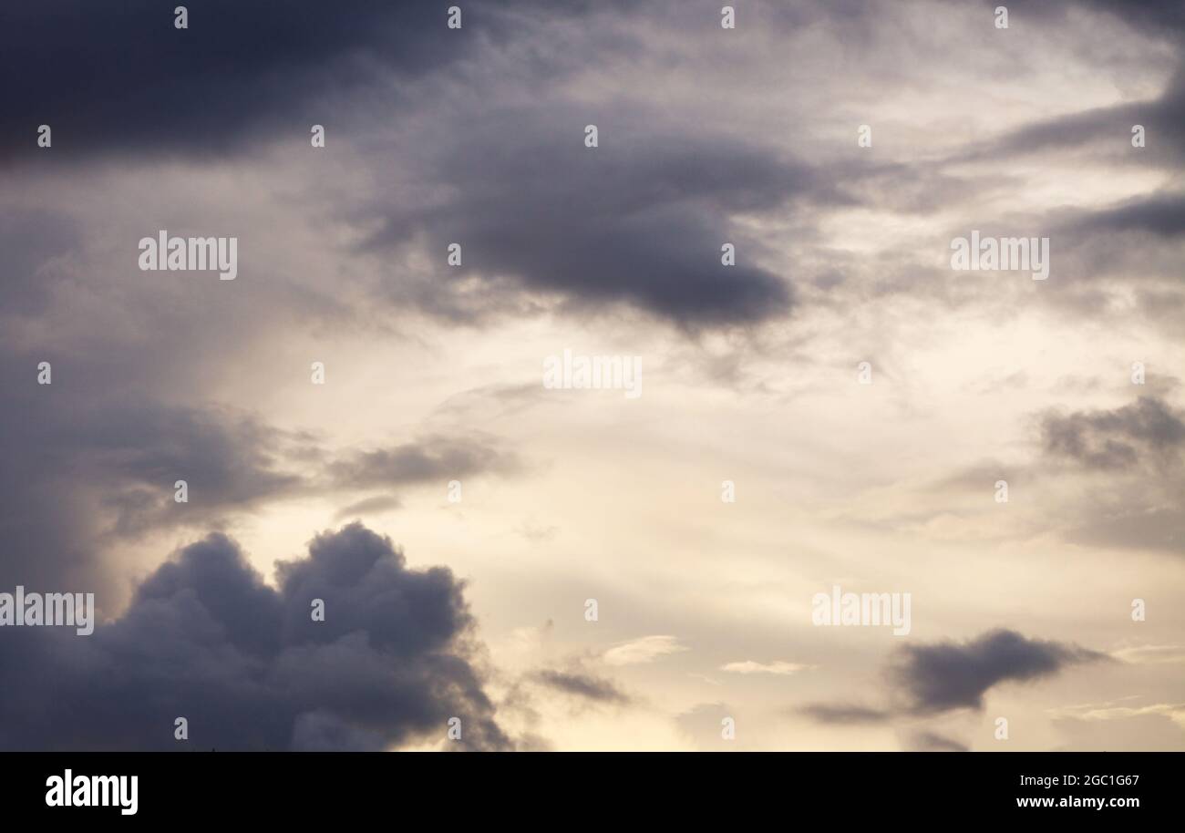 Dramatic sunset sky with clouds in windy summer day Stock Photo - Alamy