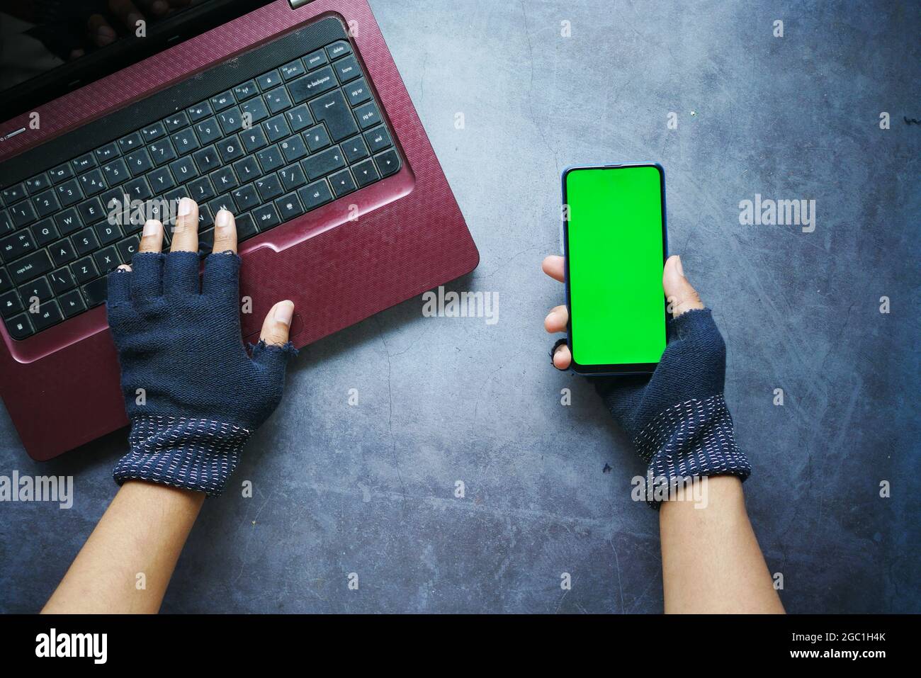 hacker hand stealing data from smart phone Stock Photo - Alamy