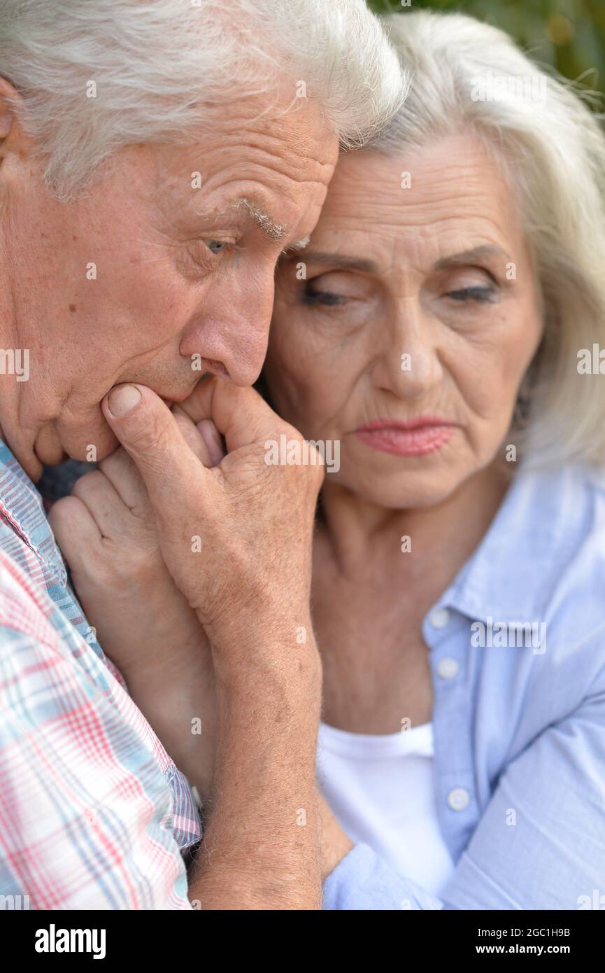 Sad couple hug park hi-res stock photography and images - Alamy