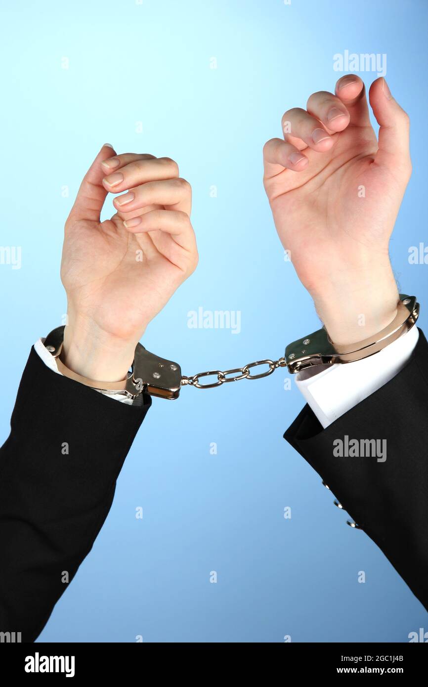 Man and woman hands and breaking handcuffs on color background Stock ...