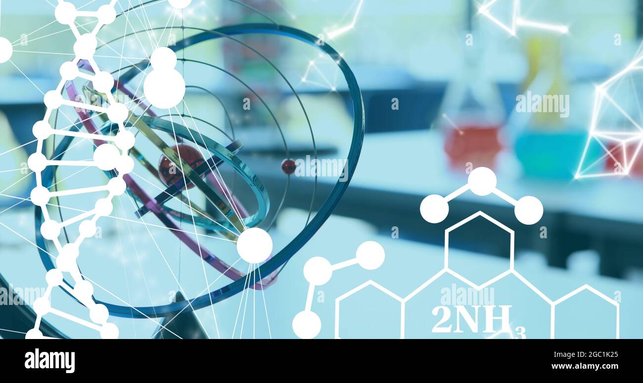 Image of molecules and dna strand over desk in classroom Stock Photo ...