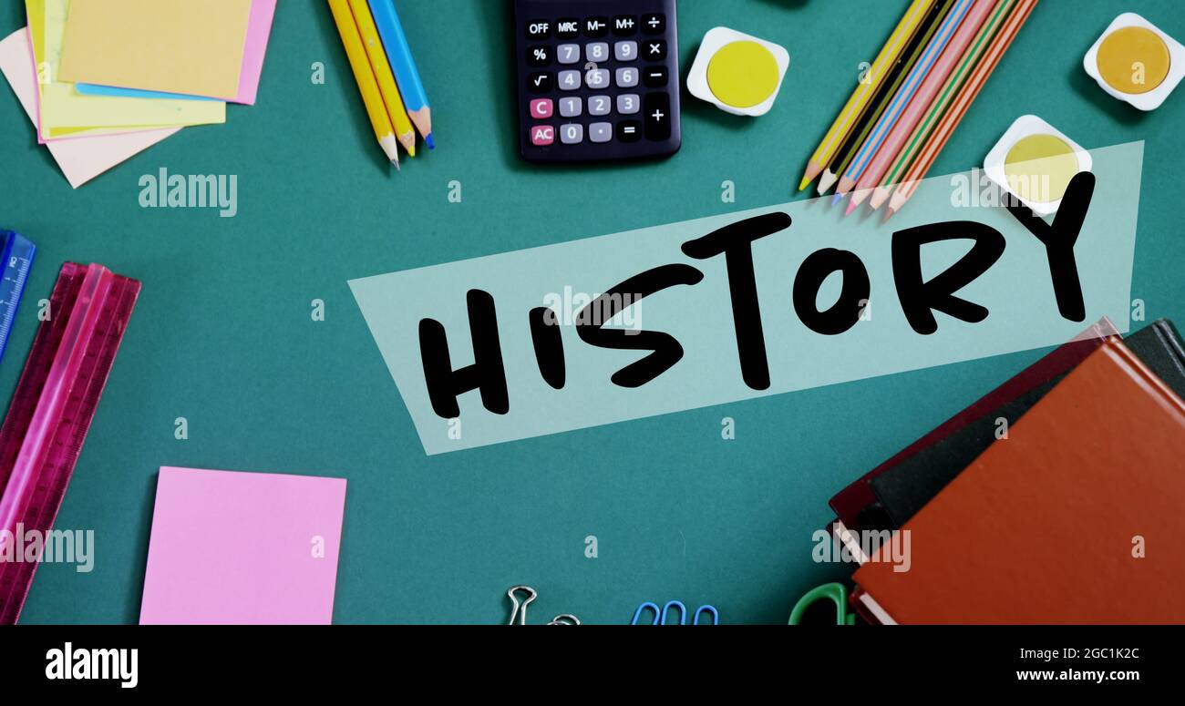Image of history text over school items on desk Stock Photo - Alamy