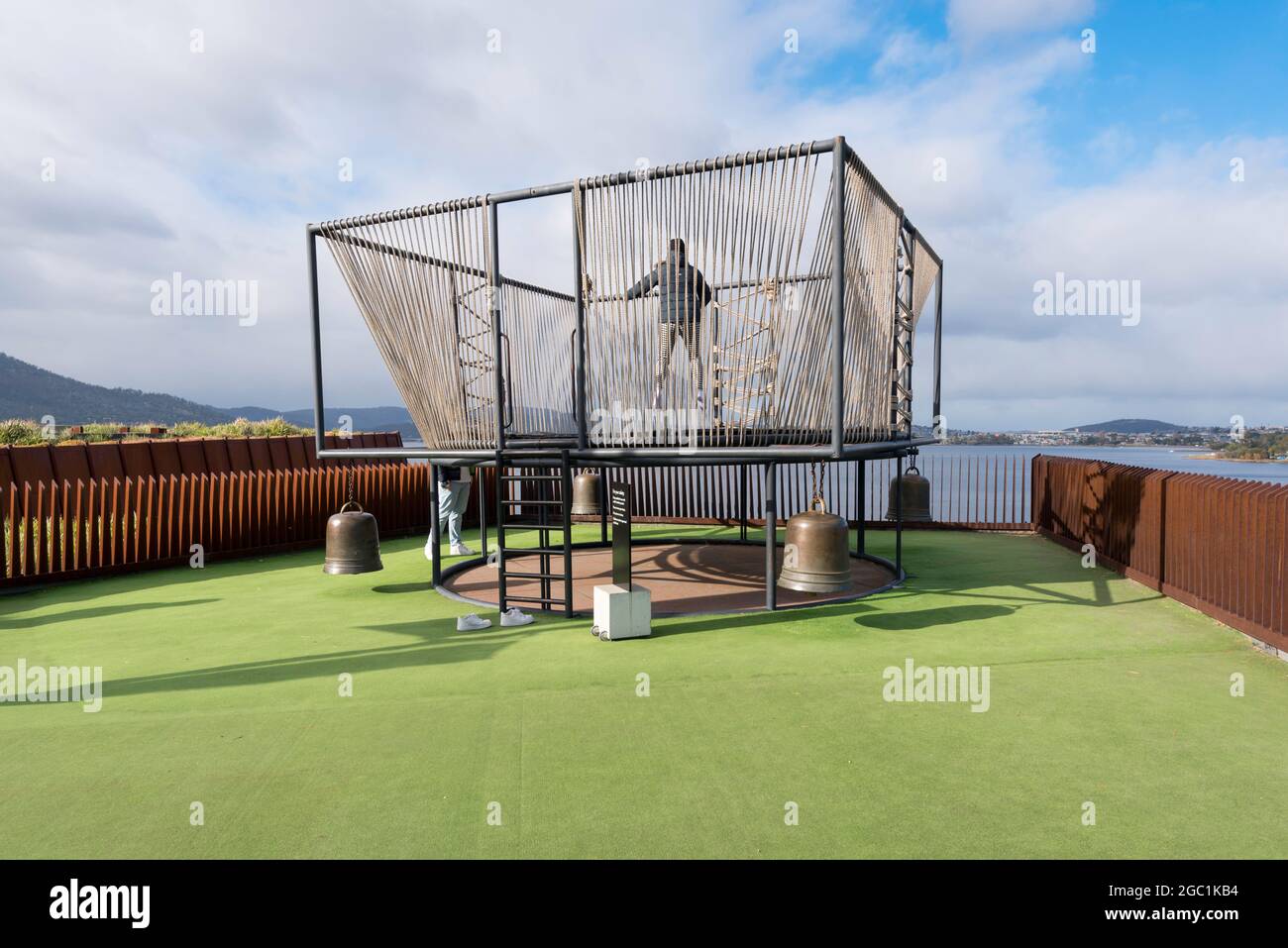 With the Derwent River as a background a person jumps on a trampoline ...