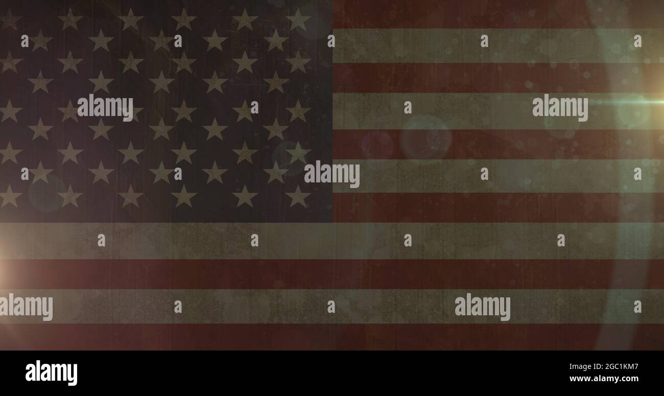 Image of glowing light moving over american flag Stock Photo - Alamy