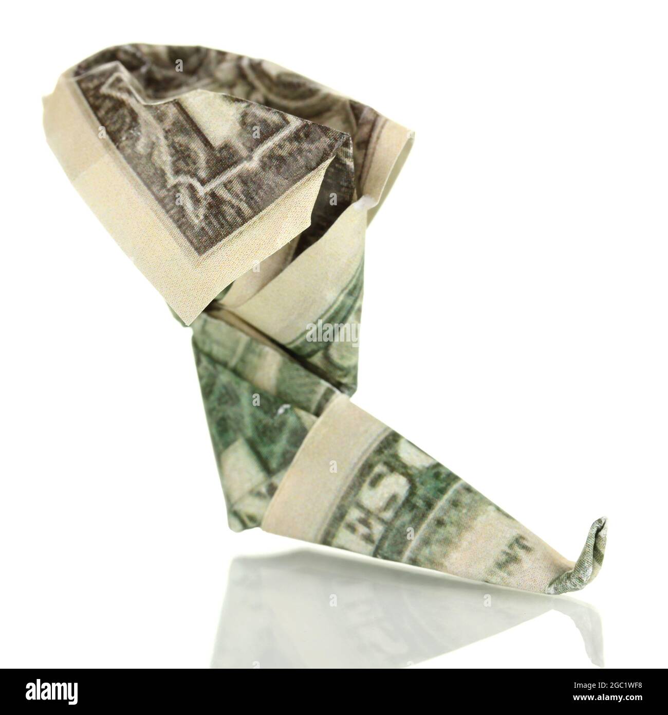 Dollar folded into boots isolated on white Stock Photo - Alamy