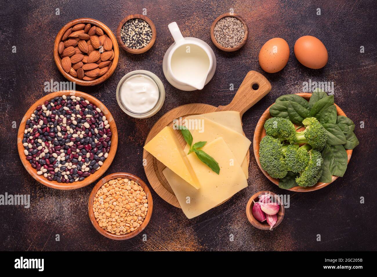Products rich in calcium on dark background. Healthy food. Top view ...