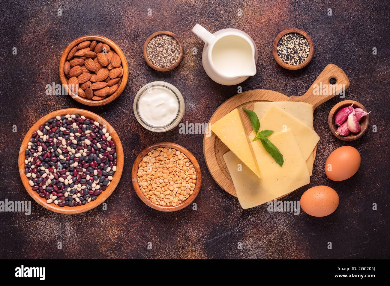 Products rich in calcium on dark background. Healthy food. Top view ...
