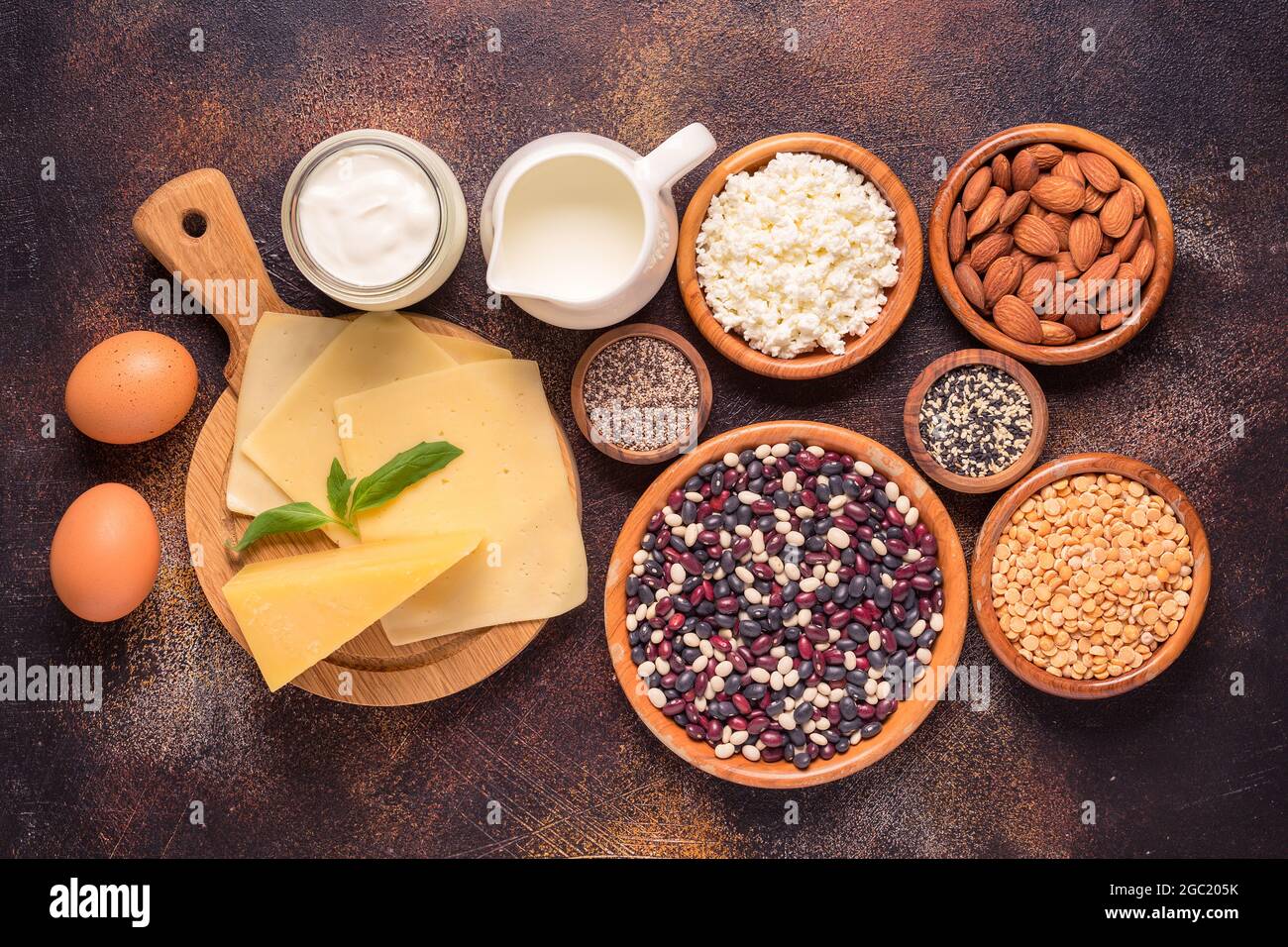 Products rich in calcium on dark background. Healthy food. Top view ...