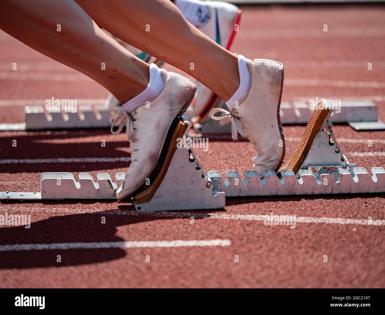 Girl in starting blocks on hi-res stock photography and images - Alamy