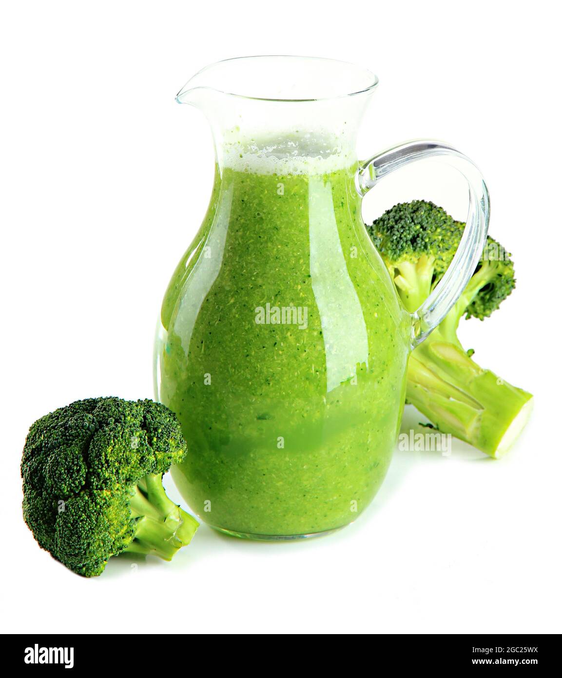 Glass pitcher of broccoli juice isolated on white Stock Photo - Alamy