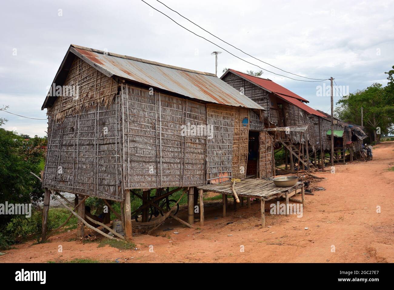 Village with wooden cabins in Cambodia Stock Photo - Alamy