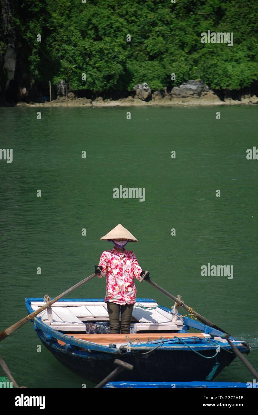 Vietnamese women people rowing retro vintage boat for bring foreign ...