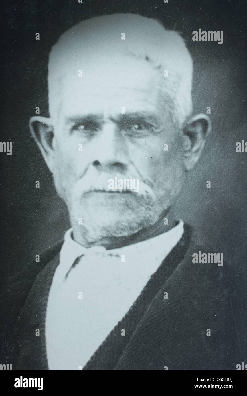 An old photo of an elderly man posing for a formal portrait Stock Photo ...