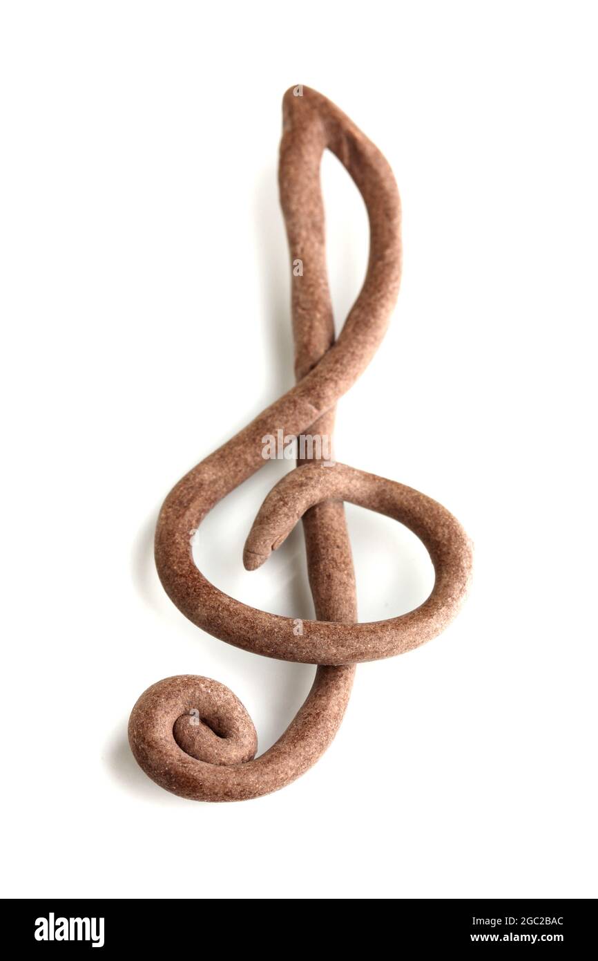 Treble clef isolated on white Stock Photo - Alamy