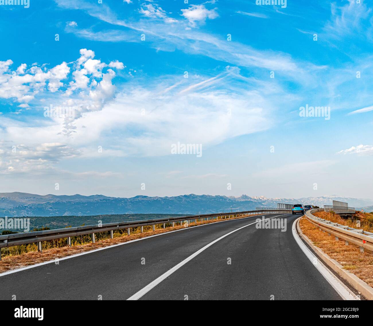 Scenic road. Road is surrounded by a magnificent natural landscape ...