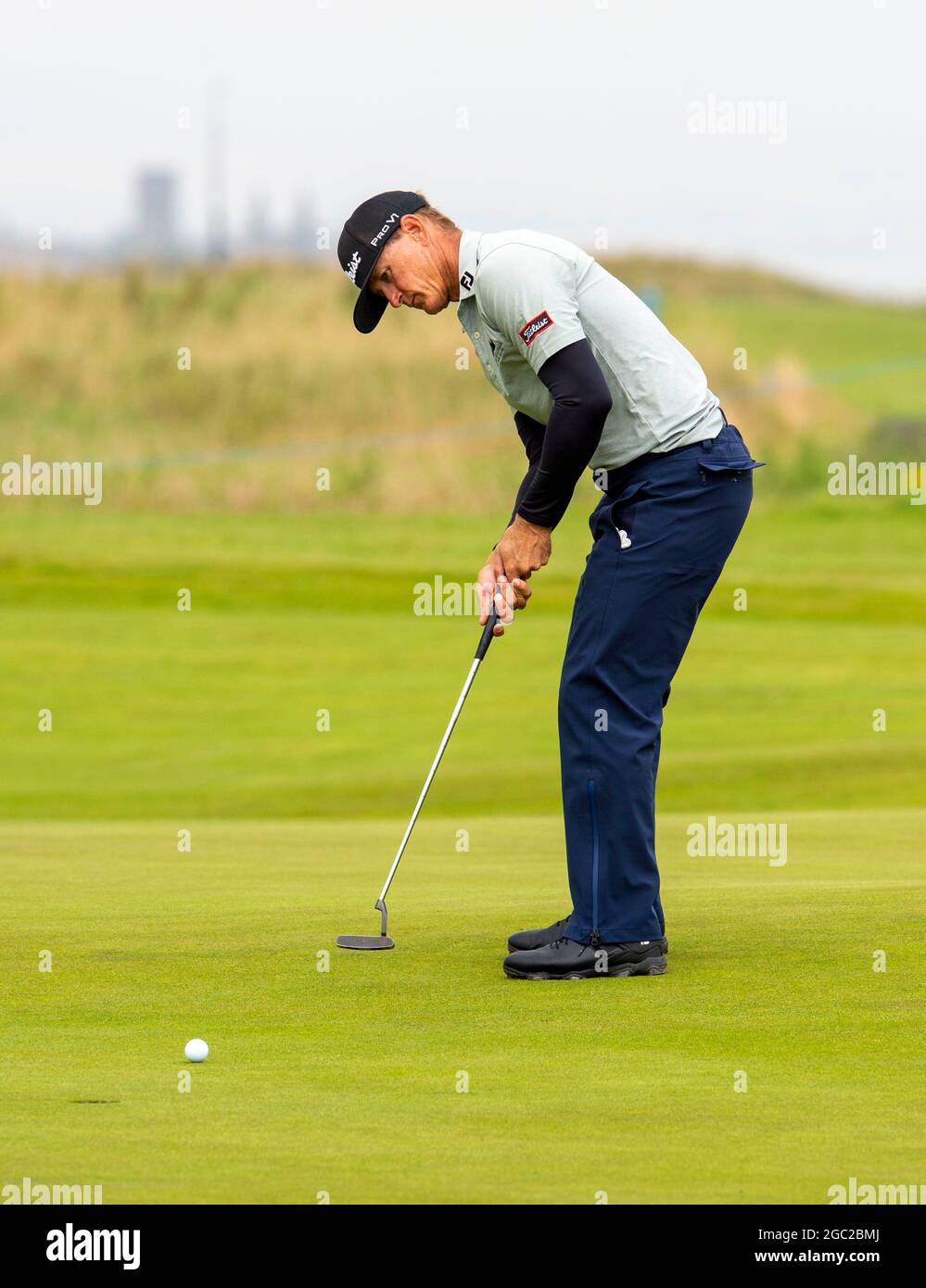 USA's Berry Henson holes a put on the 14th green during day two of the ...