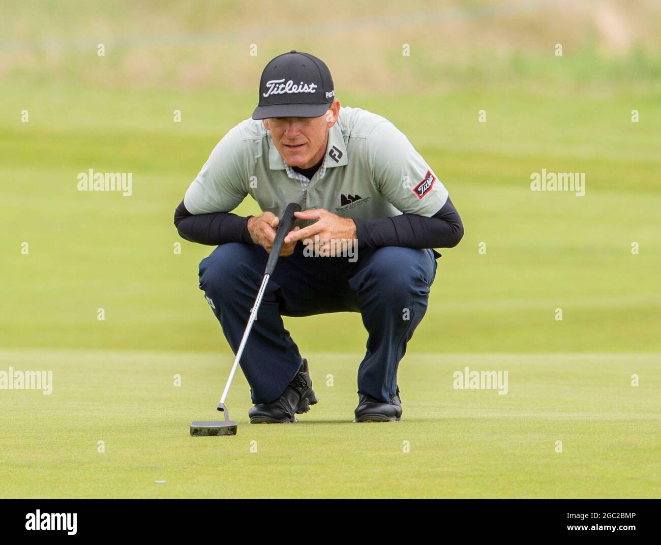 USA's Berry Henson lines up a put on the 14th green during day two of ...