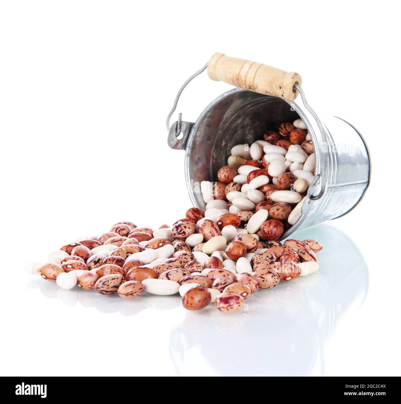 Overturned bucket with beans isolated on white Stock Photo - Alamy