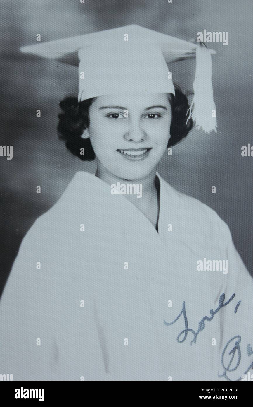 An old photo of a graduation photo of a young woman in her graduation ...
