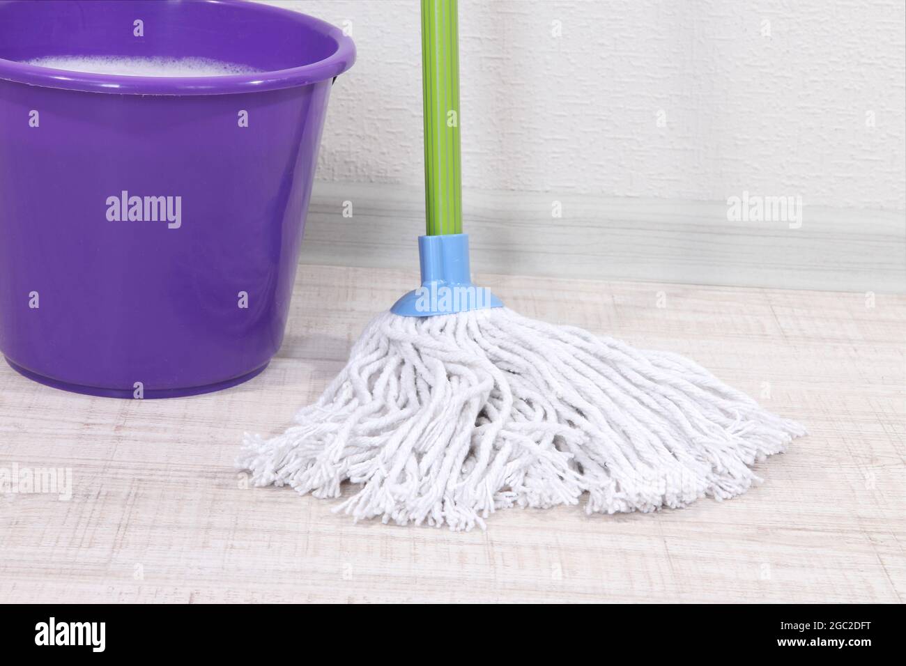 Washing the floor and all floor cleaning Stock Photo - Alamy