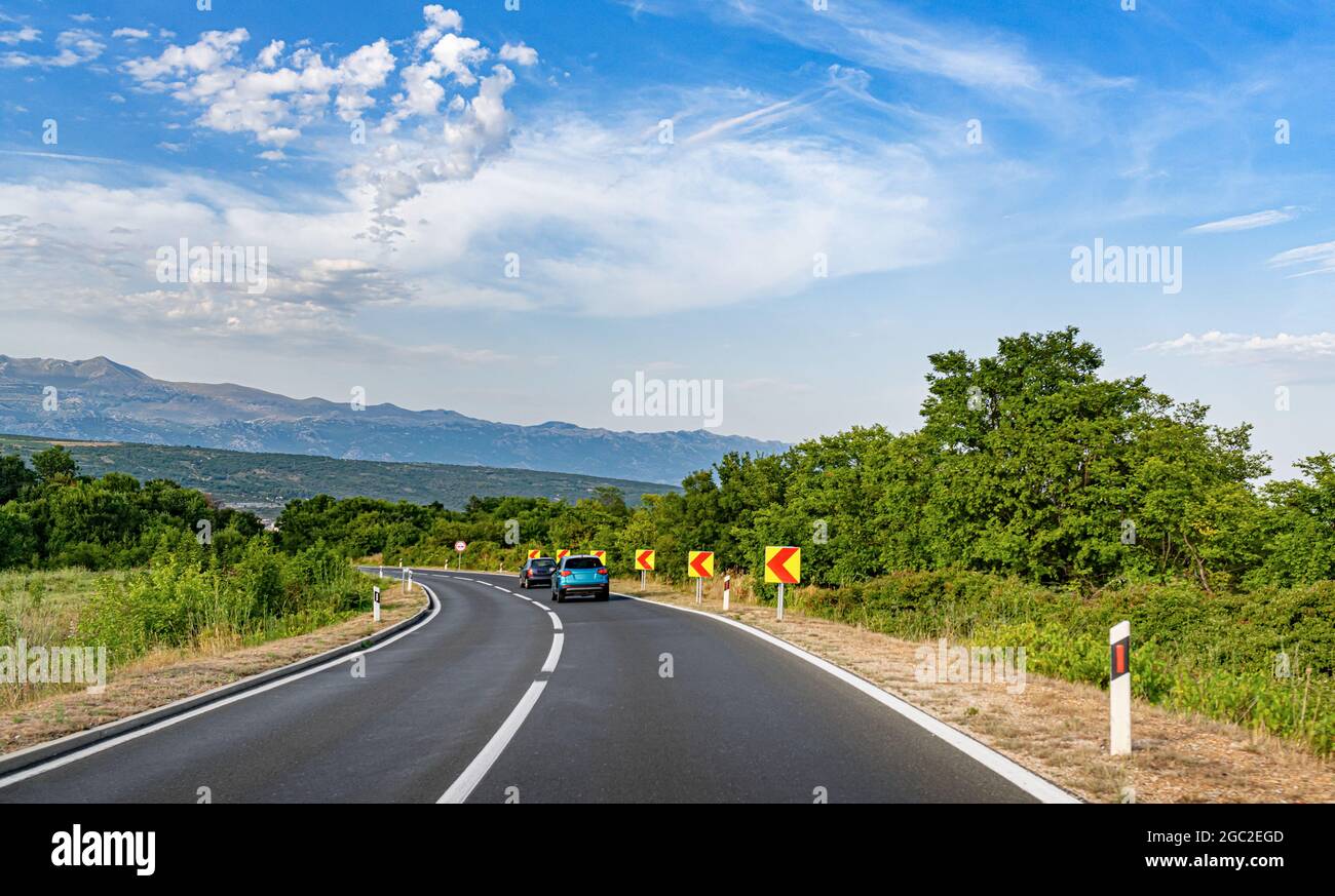 Scenic road. Road is surrounded by a magnificent natural landscape ...