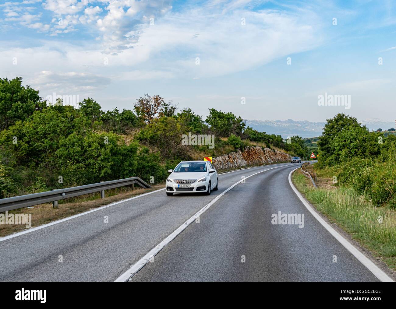 Scenic road. Road is surrounded by a magnificent natural landscape ...