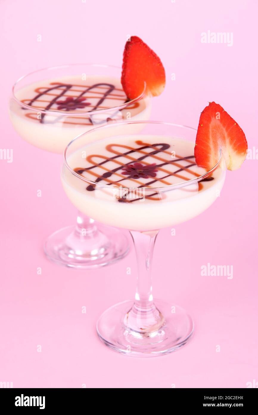 Fruit smoothies on pink background Stock Photo - Alamy