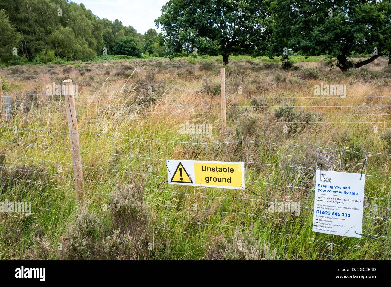 The Coal Authority warning notice of unstable ground Stock Photo - Alamy