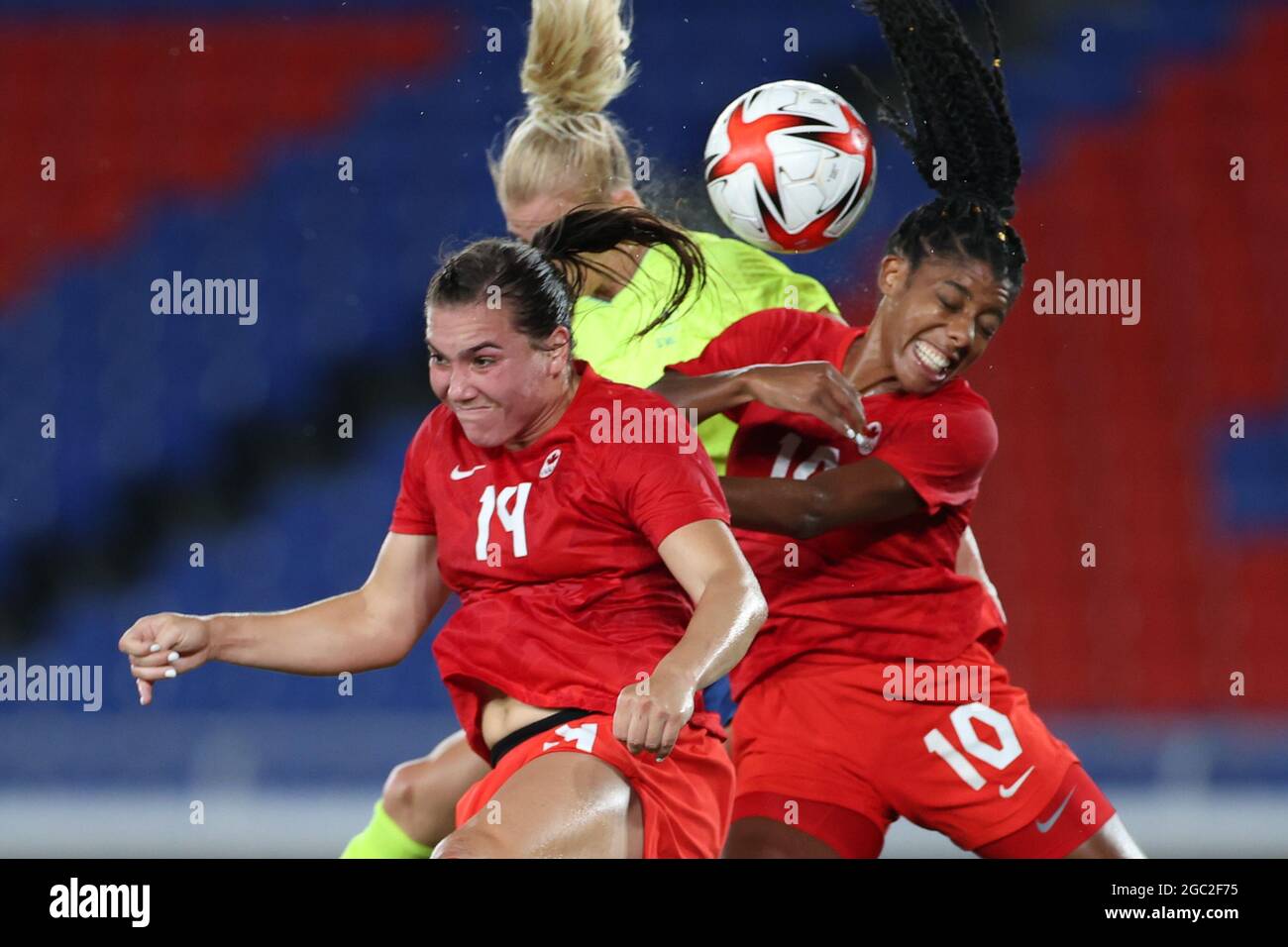 Yokohama, Japan. 6th Aug, 2021. Jordyn Huitema (L) and Ashley Lawrence ...