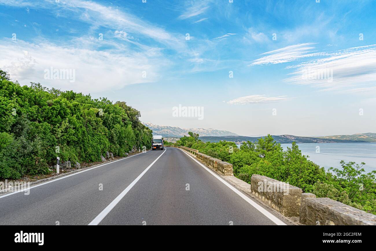 Scenic road. Road is surrounded by a magnificent natural landscape ...