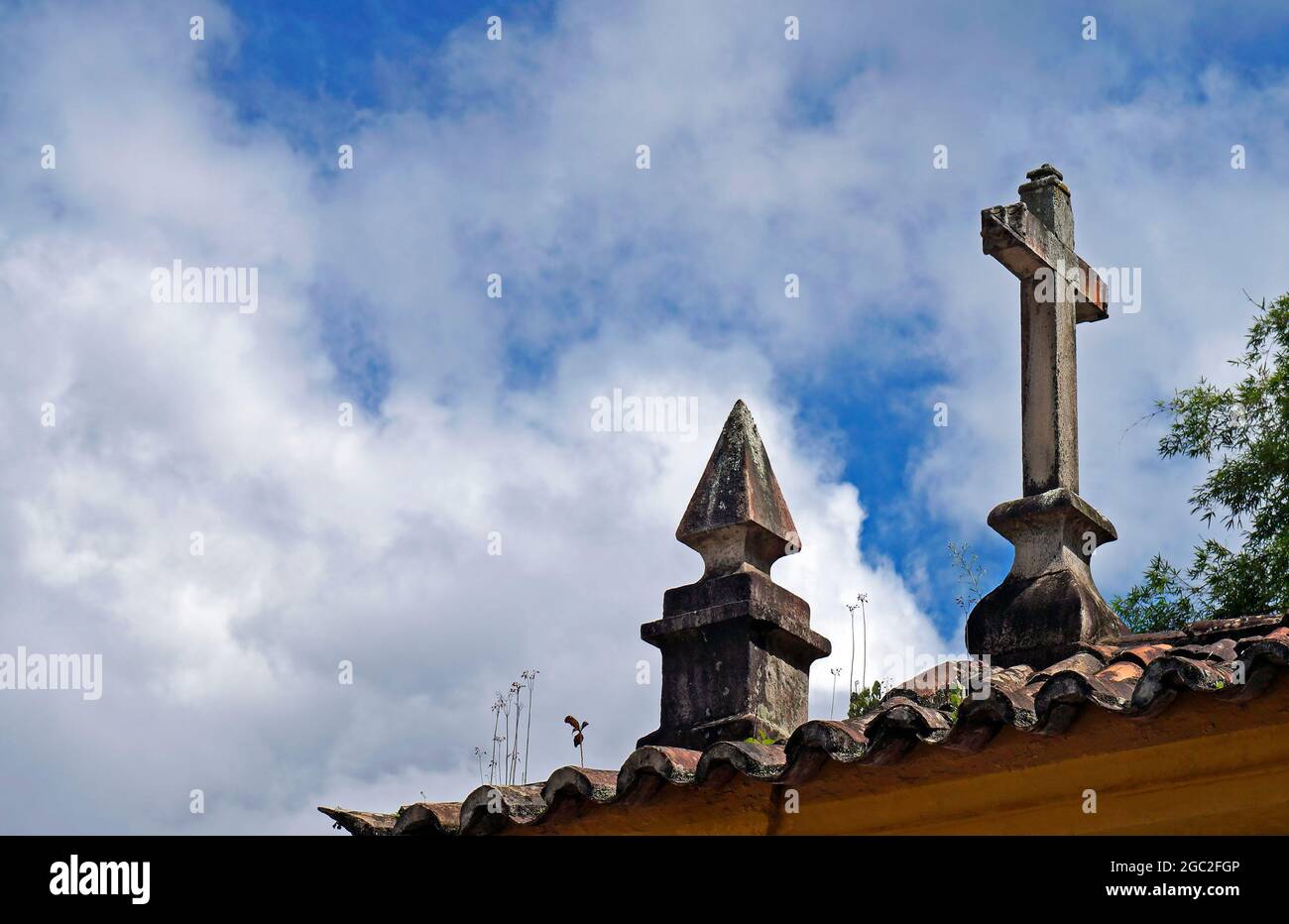 Cross and decorative pinnacle (chapel details) in Ouro Preto, Brazil ...
