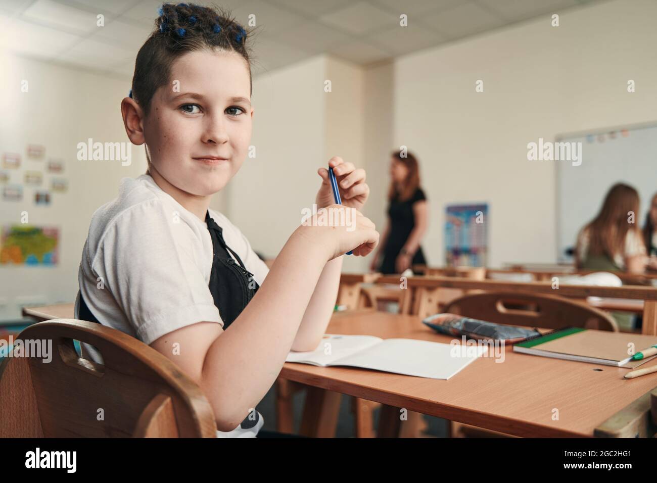 Working hard at the lesson and feeling confident Stock Photo - Alamy