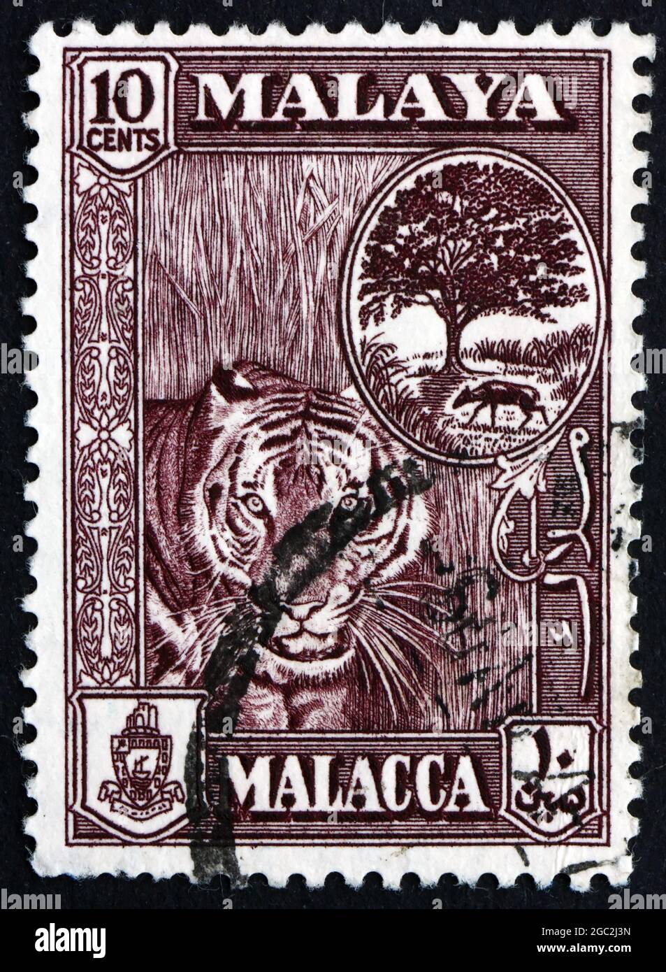 MALAYA - CIRCA 1960: a stamp printed in Malaya shows Tiger with Melaka ...