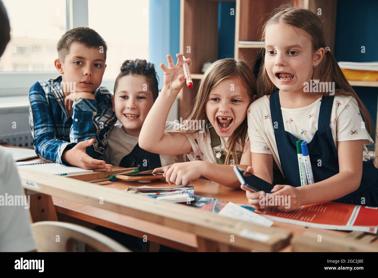 Pupils of the elementary school having fun Stock Photo - Alamy