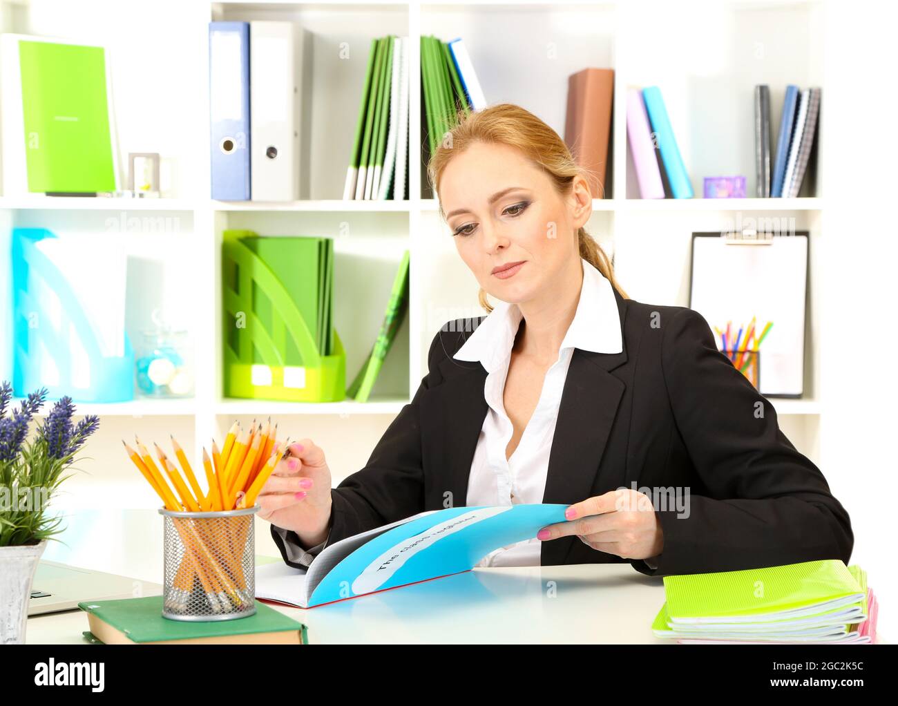 Portrait of teacher woman working in classroom Stock Photo - Alamy
