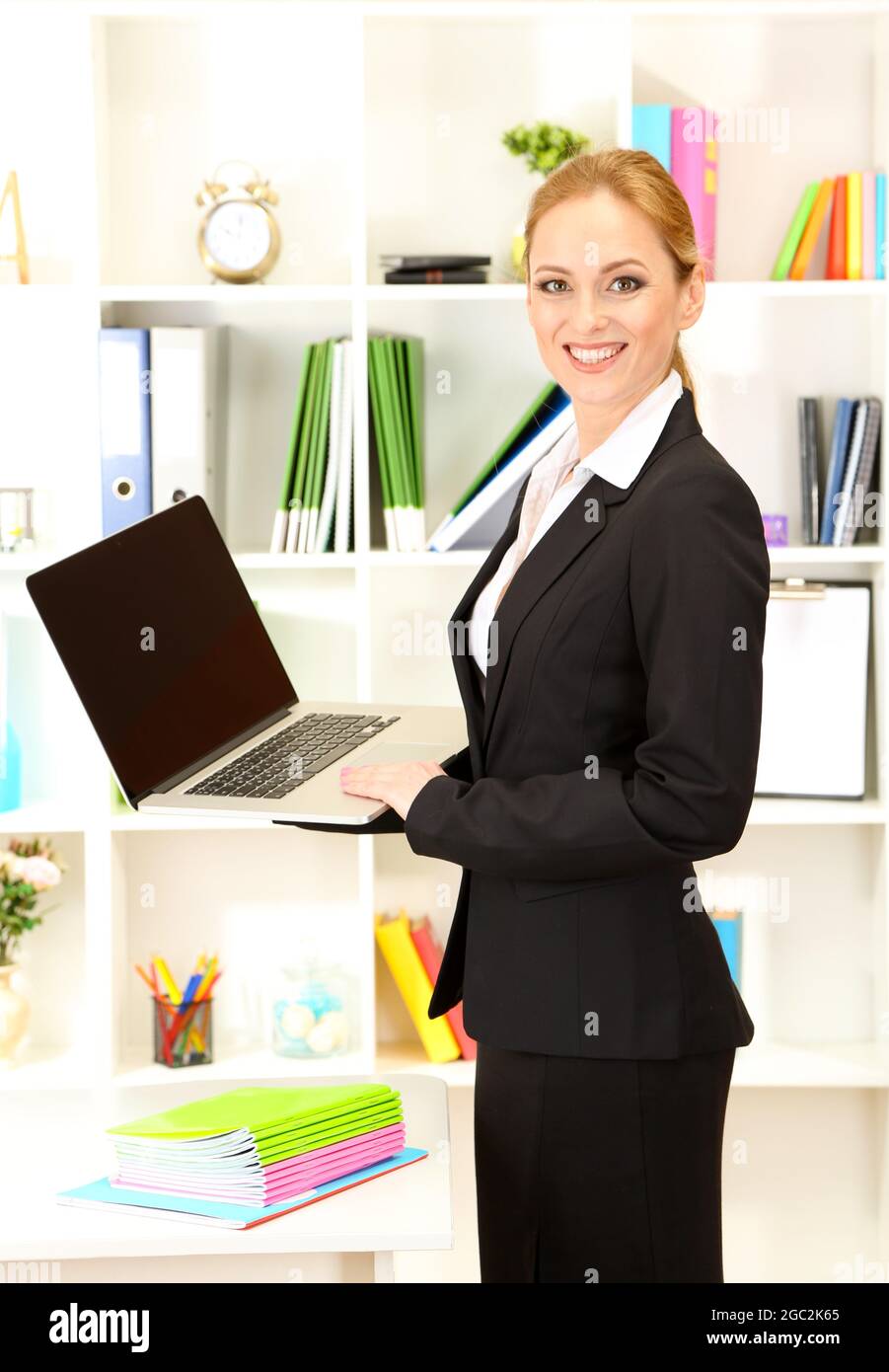 Portrait of teacher woman in classroom Stock Photo - Alamy