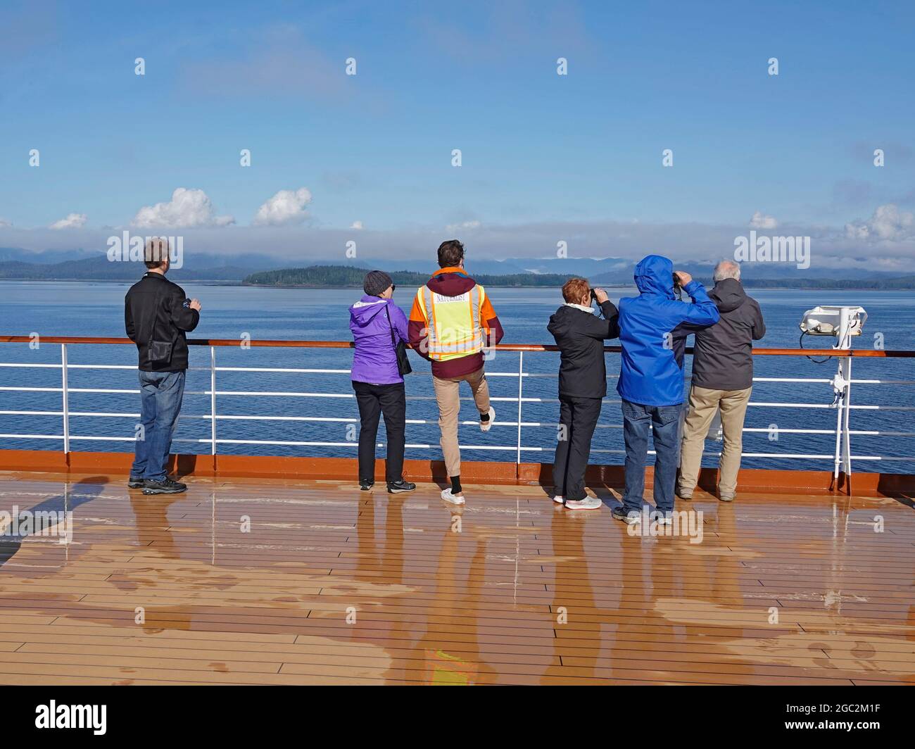 Alaska, Inside Passage, Pacific Coast; Passengers aboard a cruise ship ...