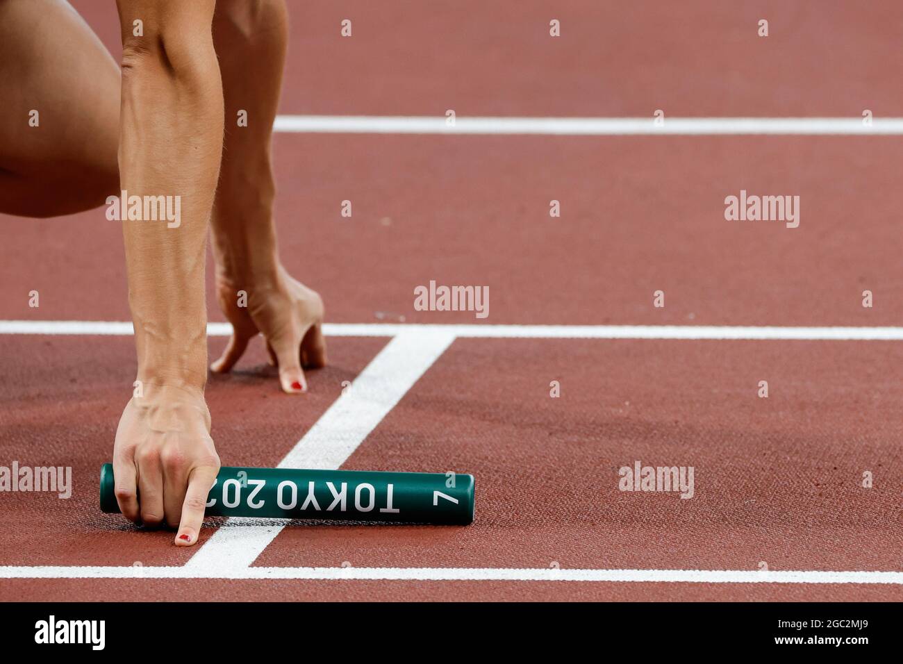 Tokyo, Japan. 06th Aug, 2021. A runner with team Switzerland readies ...