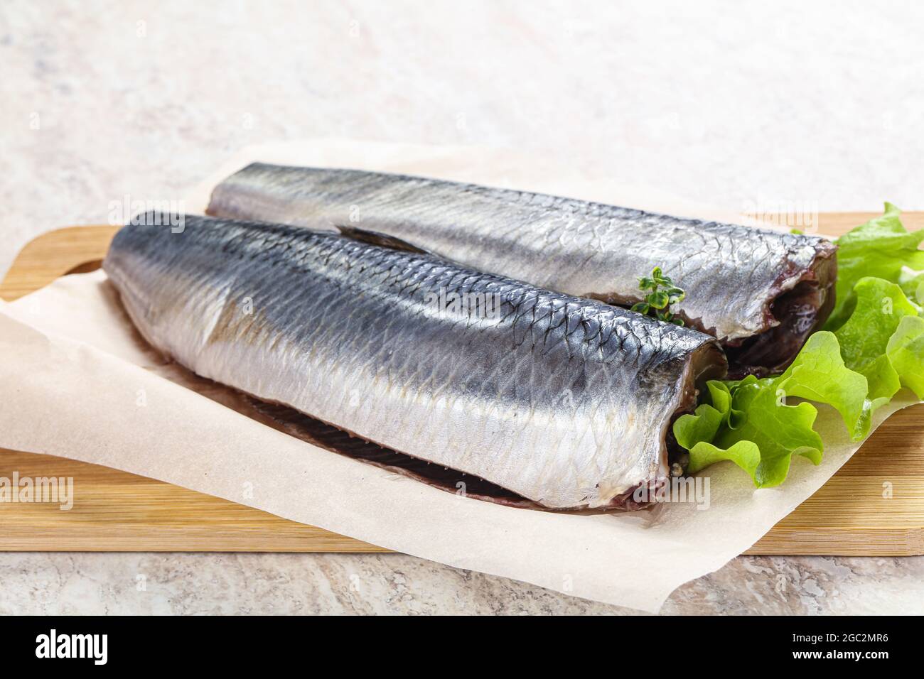 Marinated Herring fillet with skin for cooking Stock Photo - Alamy