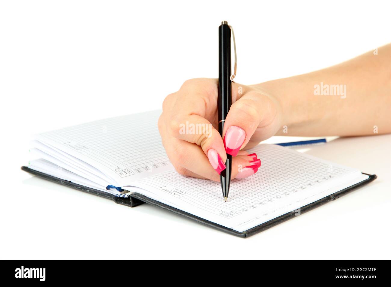 Hand signing in notebook, isolated on white Stock Photo - Alamy