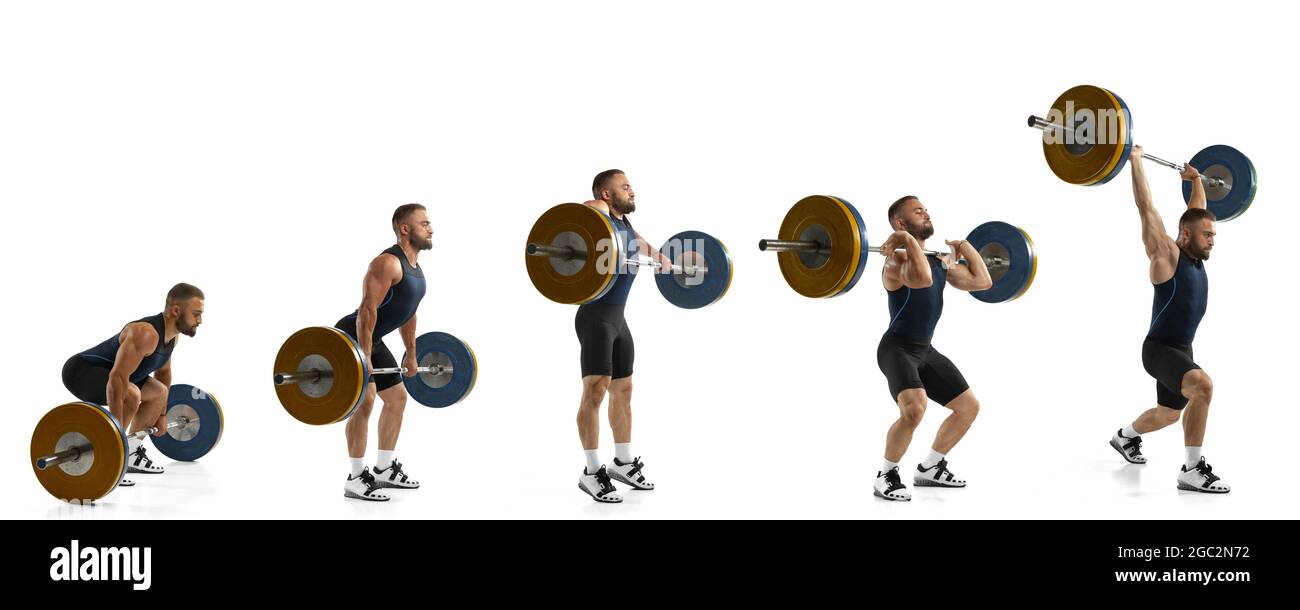 In motion. Young male weightlifter training isolated over white ...