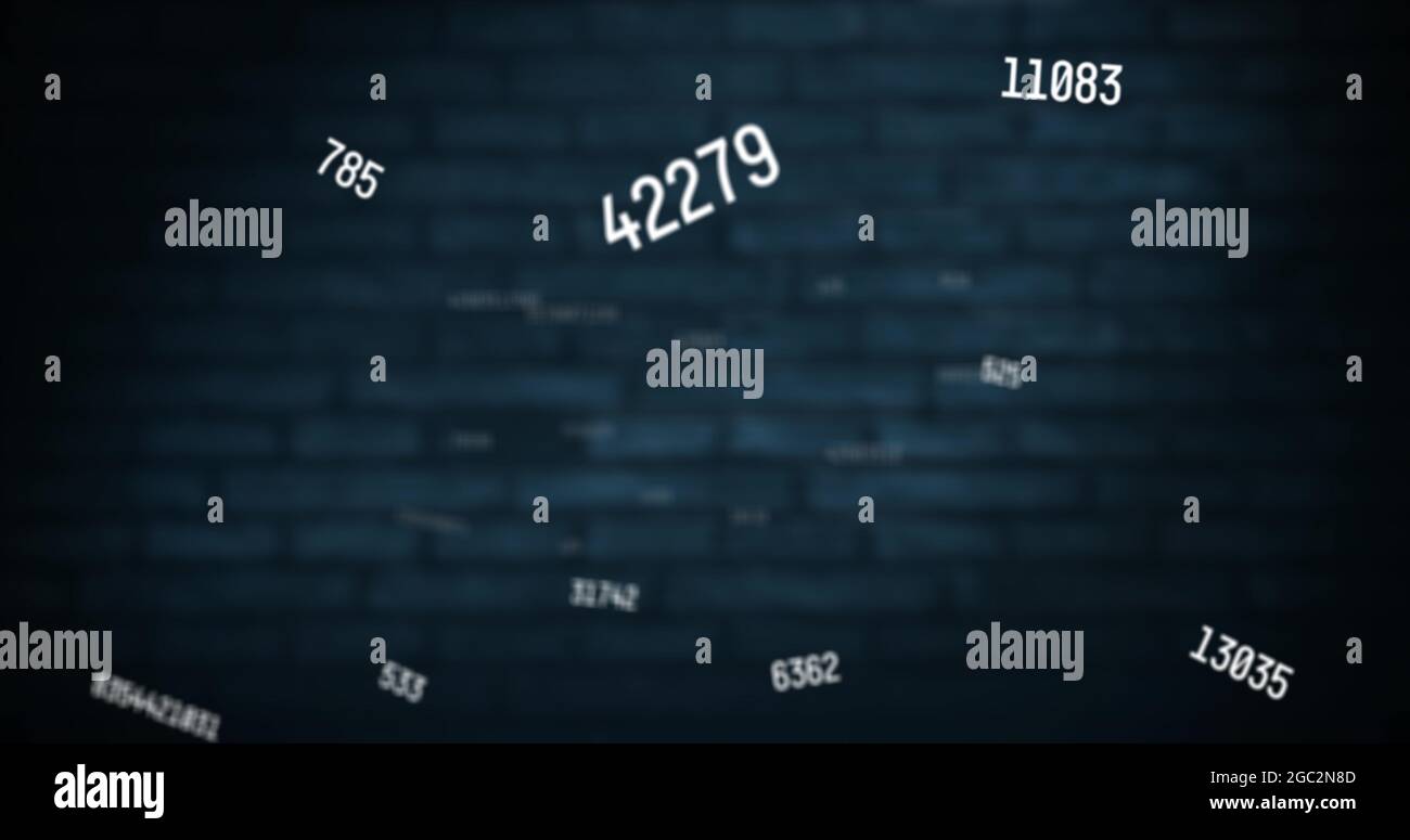 Digital composition of multiple changing numbers floating against brick wall in background Stock ...