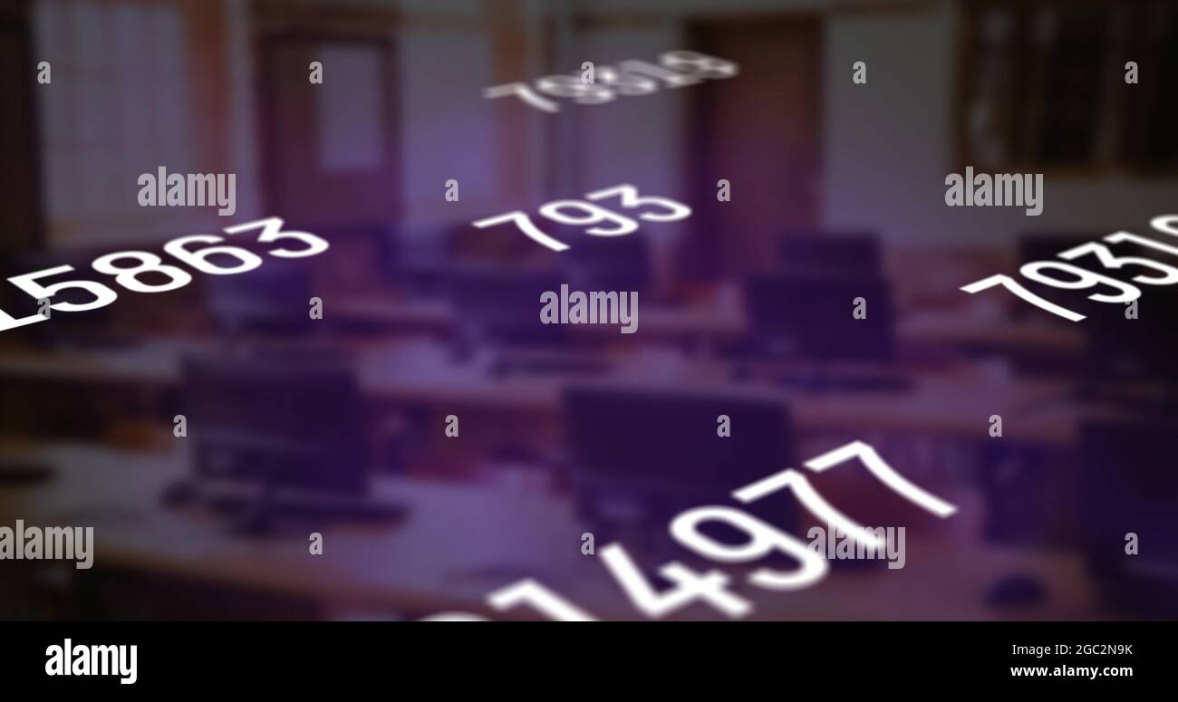 Digital composition of multiple changing numbers floating against empty classroom in background ...