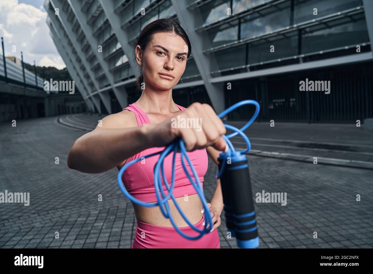 Woman holding tangled rope hi-res stock photography and images - Alamy