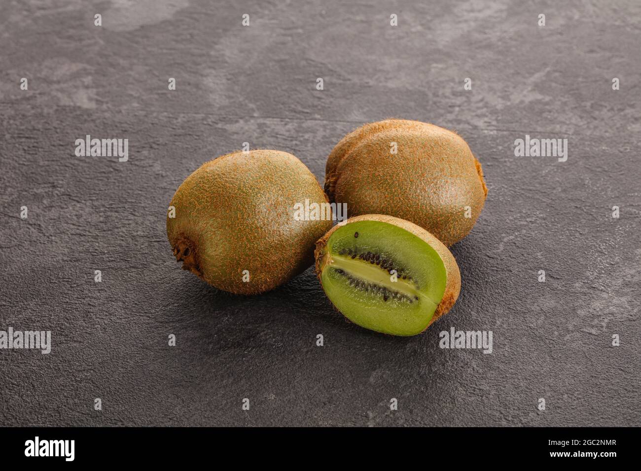 Sweet ripe and juicy kiwi fruit with slice Stock Photo - Alamy