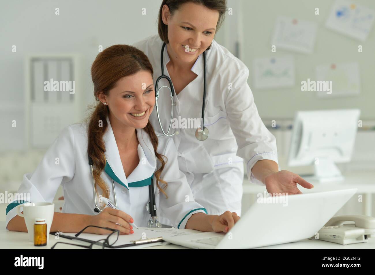 Portrait of female doctors working in hospital Stock Photo - Alamy