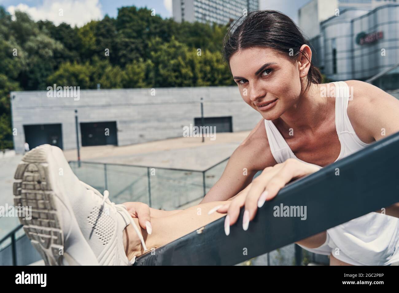 Female raising foot hi-res stock photography and images - Alamy